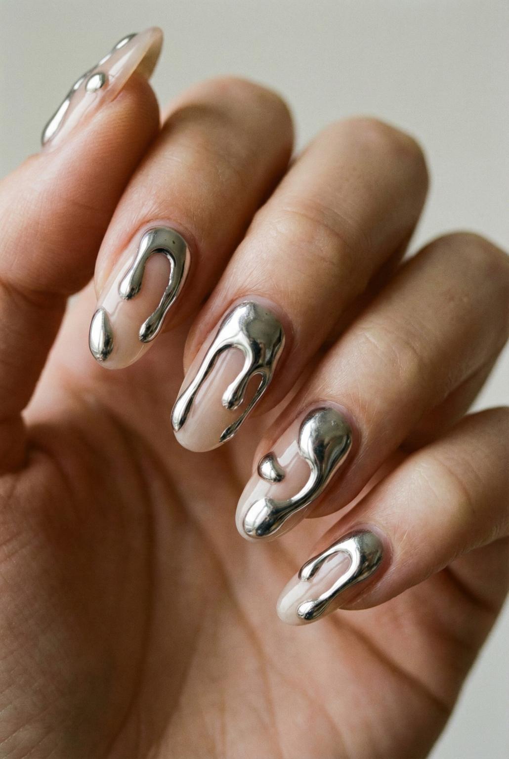 The Modern Edge of Silver Chrome and Molten Nails | Women's Alphabet
